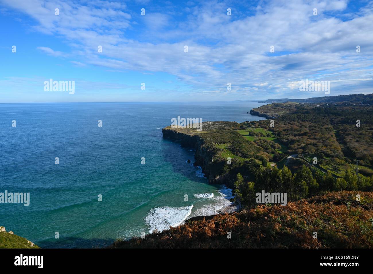 A picturesque seascape featuring dramatic coastal cliffs overlooking ...