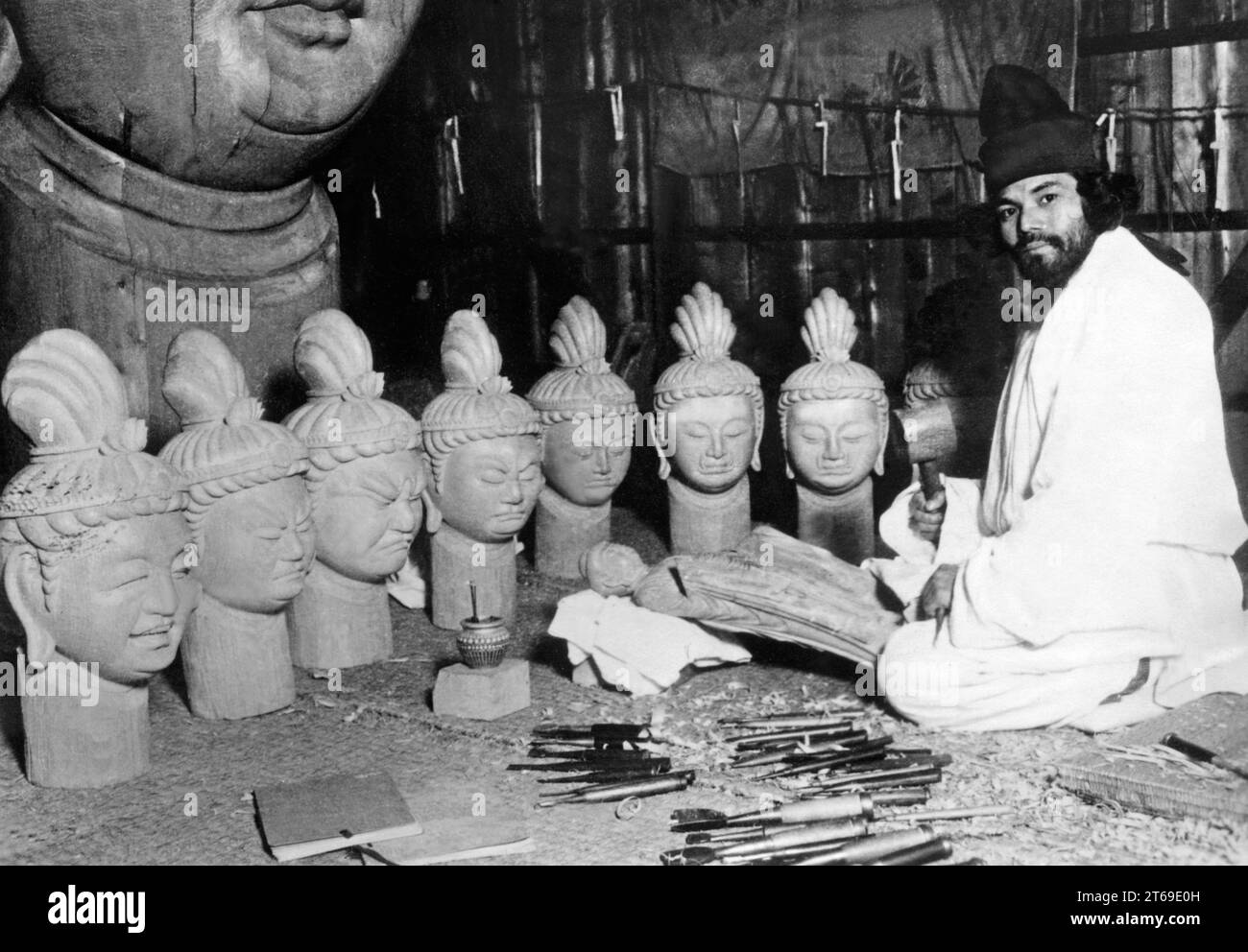 Japanese carver Kadoi-san in front of part of his Buddha statue for the ...