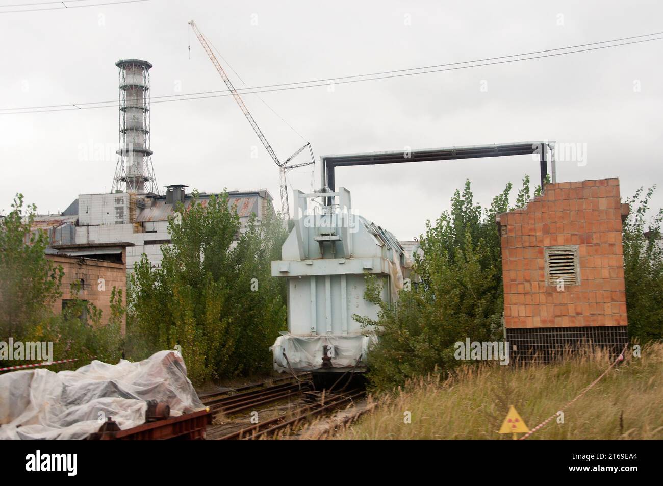 An abandoned and contaminated train with Reactor 4 of Chernobyl in the ...
