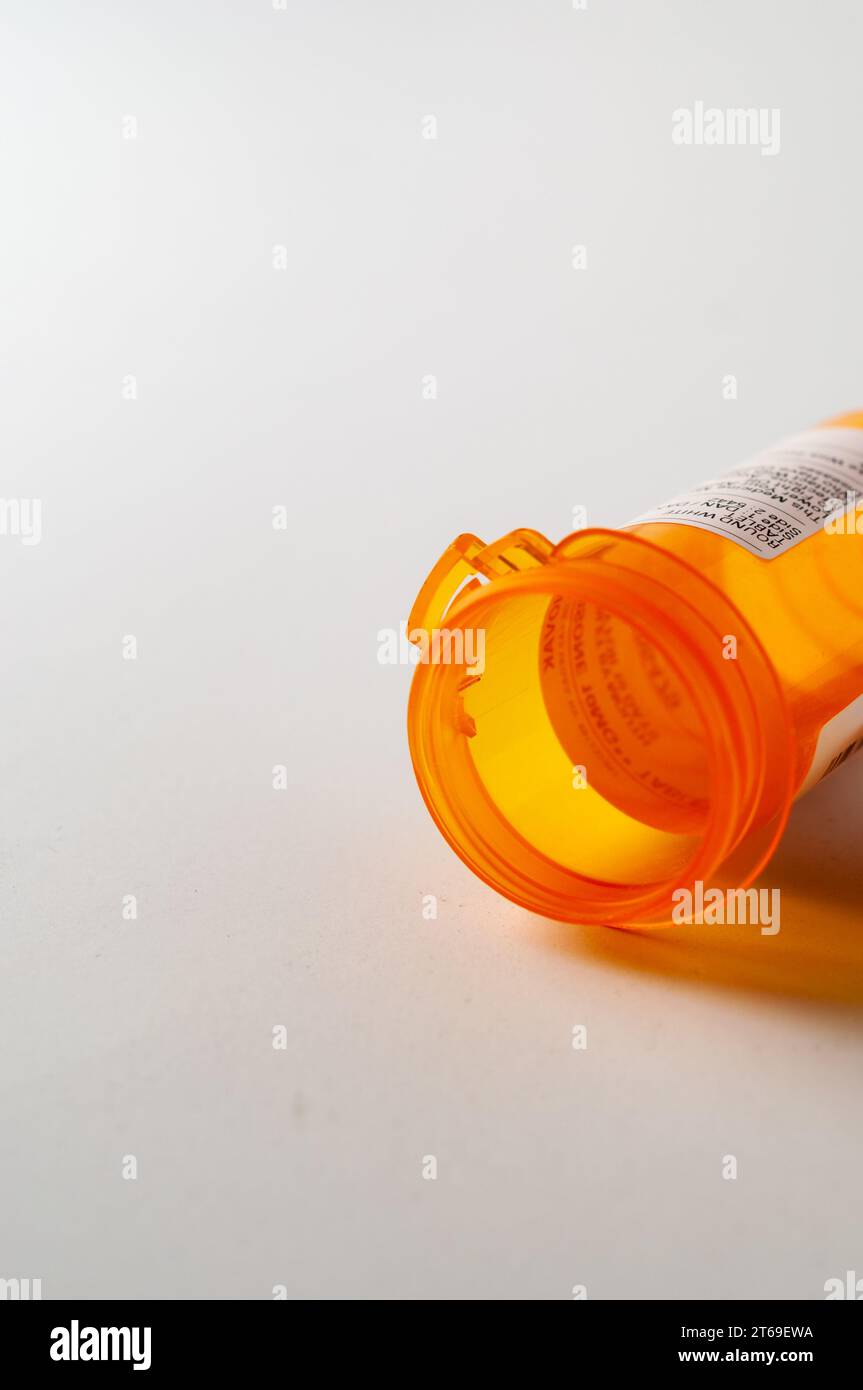 Empty Prescription Pill Bottles Tipped Over With the Patient Label ...