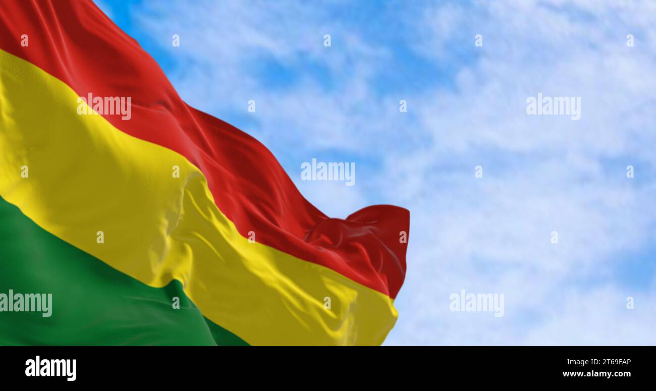 Bolivia national flag waving in the wind on a clear day. The ...