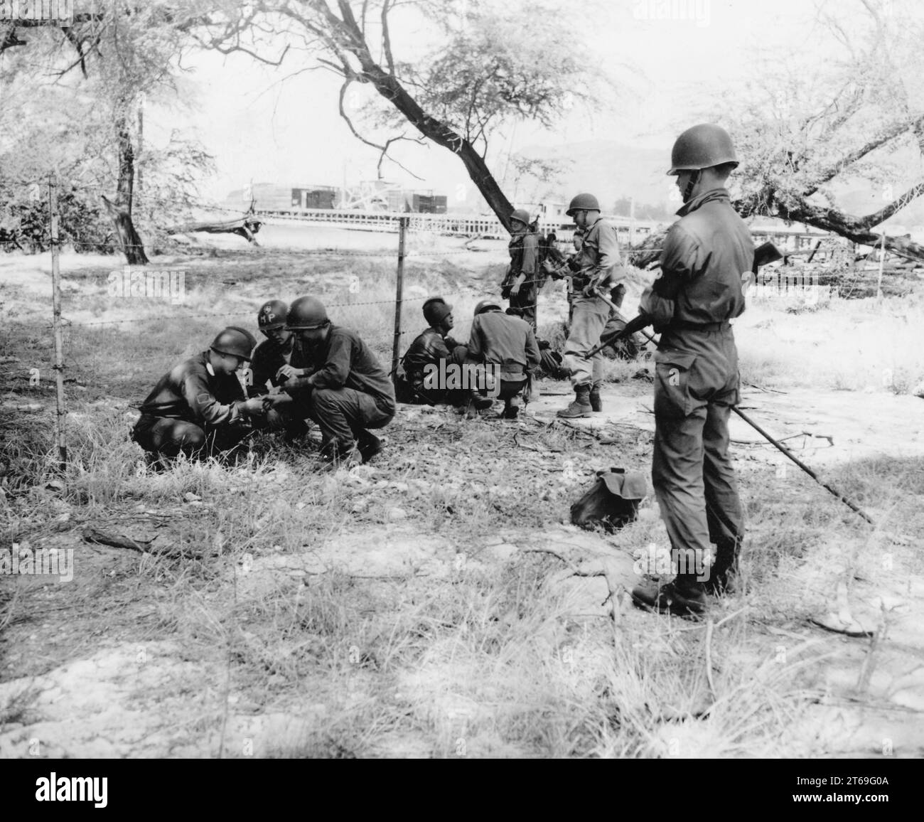 American soldiers tending to the wounded in the Pacific theater of war ...