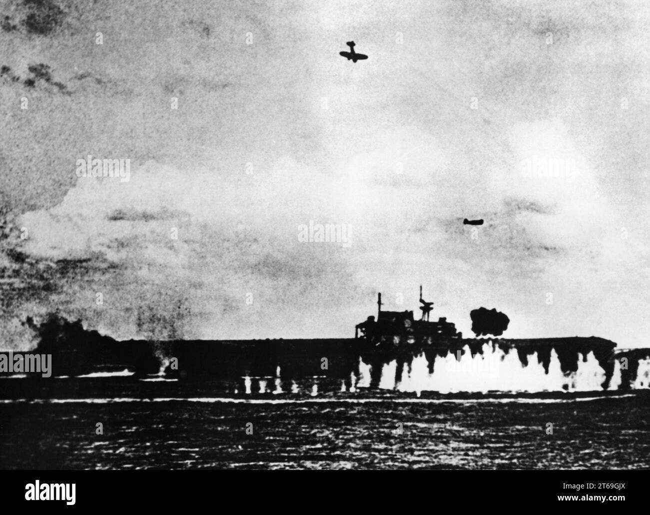Japanese dive bombers attack the American aircraft carrier USS Hornet ...