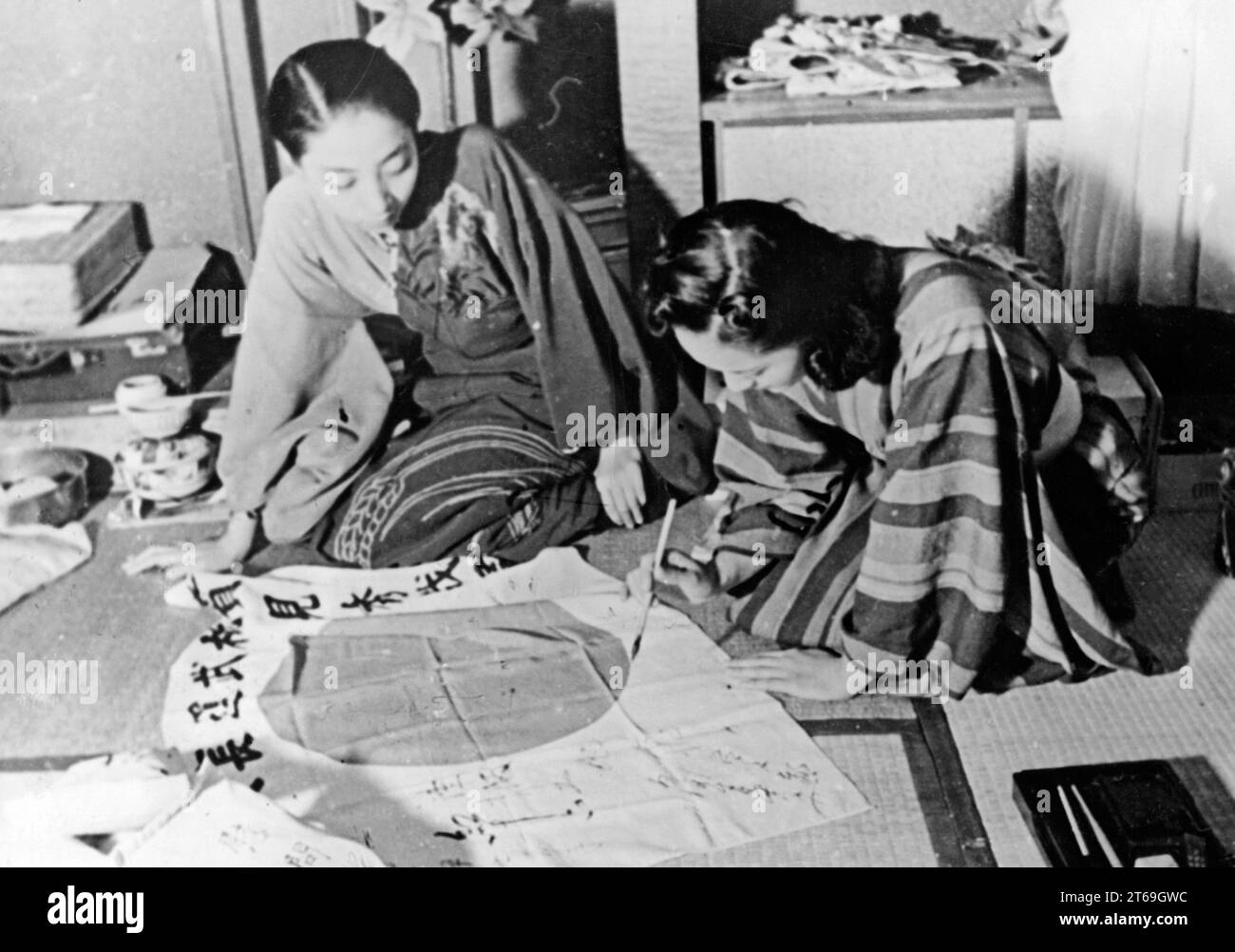 An Actress Draws Characters On A Japanese Flag The Flag Is Sent To A