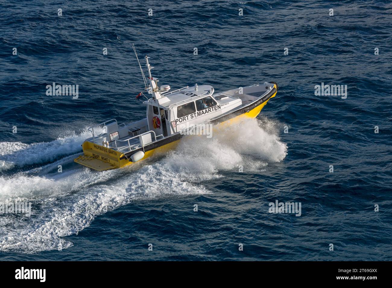 Pilot boat in the Caibbean Sea being positioned to bring the harbor ...
