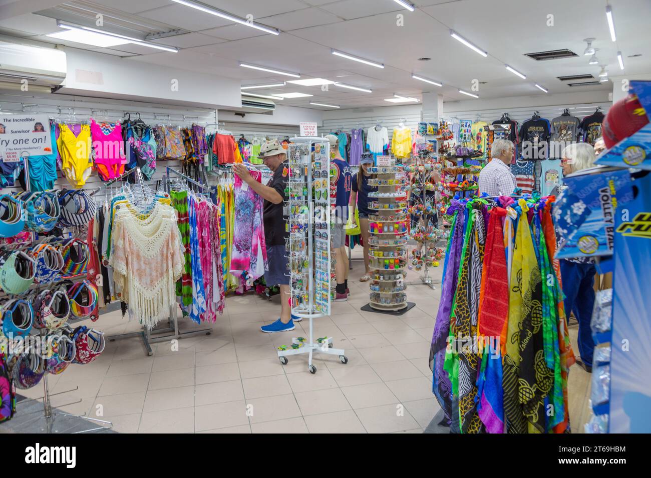 Tourists shopping at the Mystic Duty Free beach shop on Boardwak at the ...