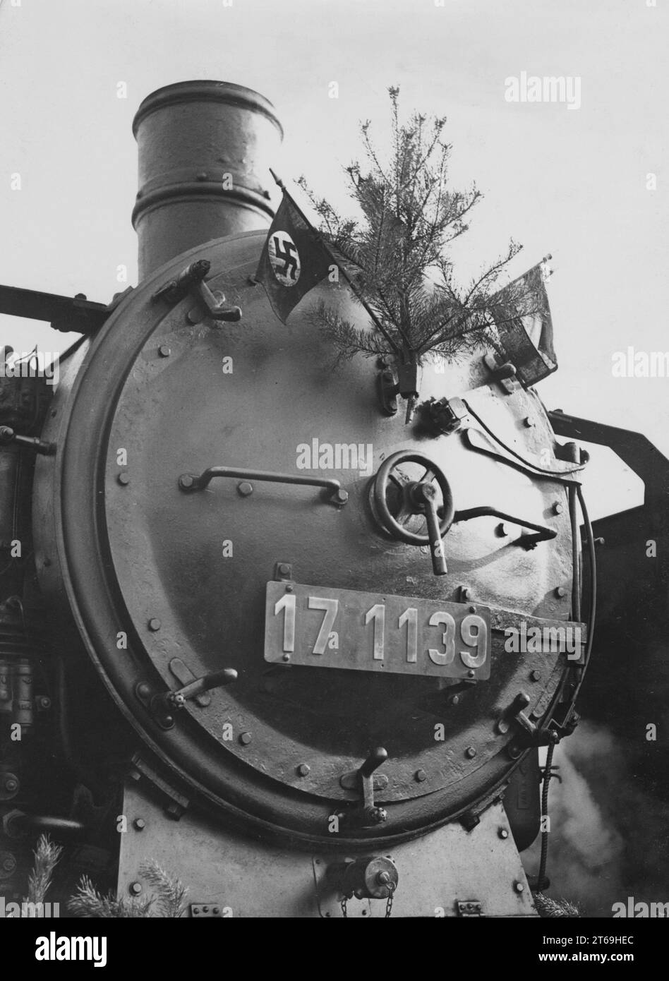 Flags and fir branches decorate a steam locomotive 17 1139 for the ...