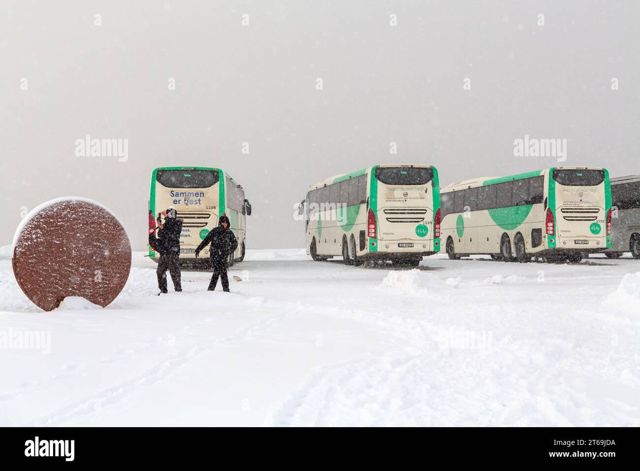Tourist buses coaches parked in the snow at North Cape, Nordkapp ...