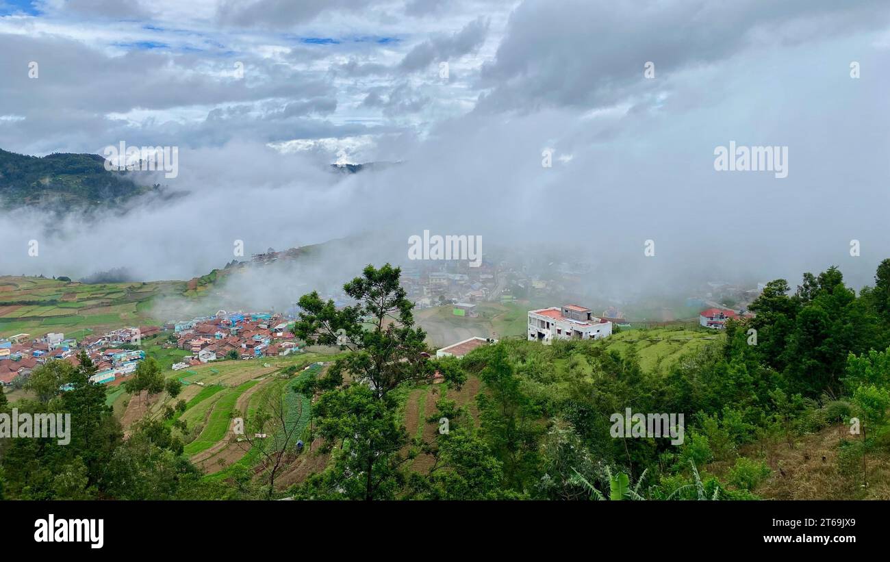An aerial view of Poombarai-Kodaikanal, India, with lush green valleys ...