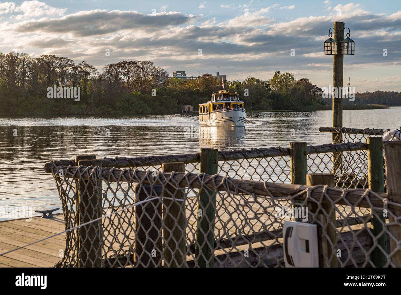 Boat carrying park guests between parks headed to the dock in Fort ...