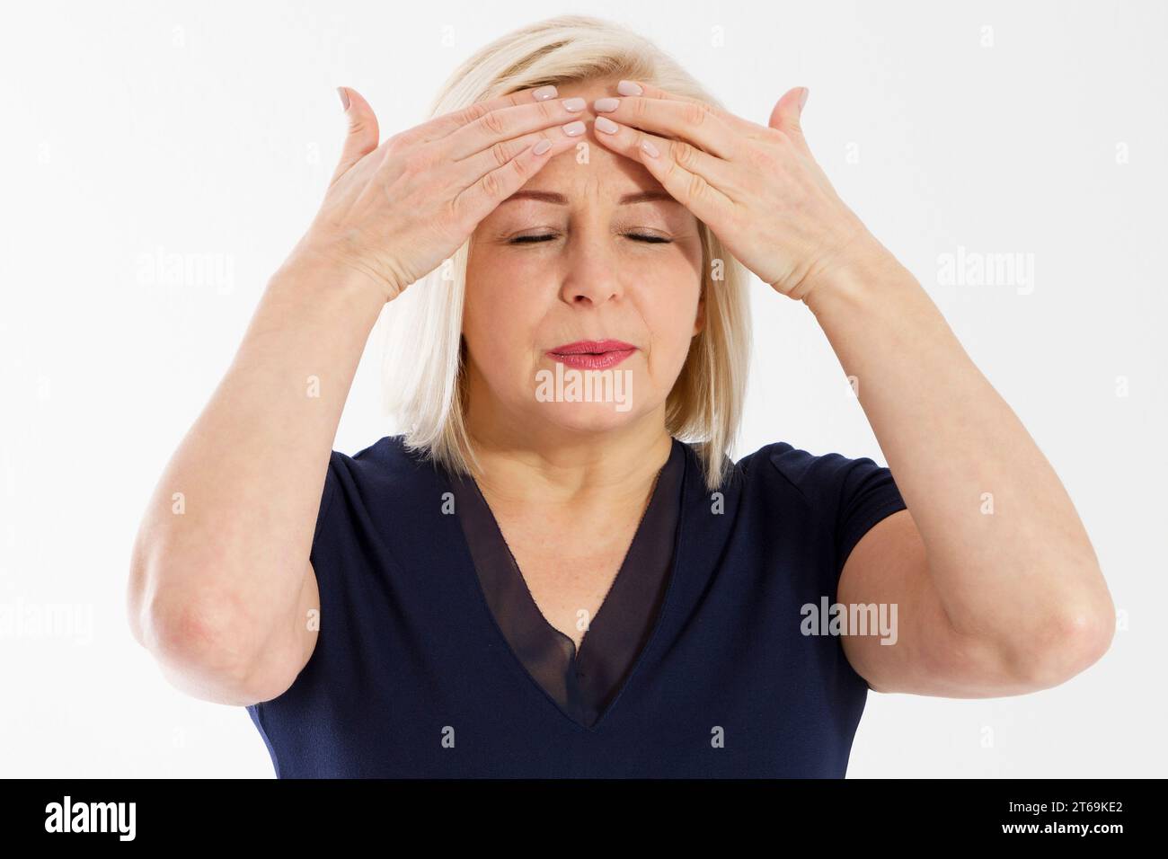Woman touching forehead, aging, woman has high body temperature ...