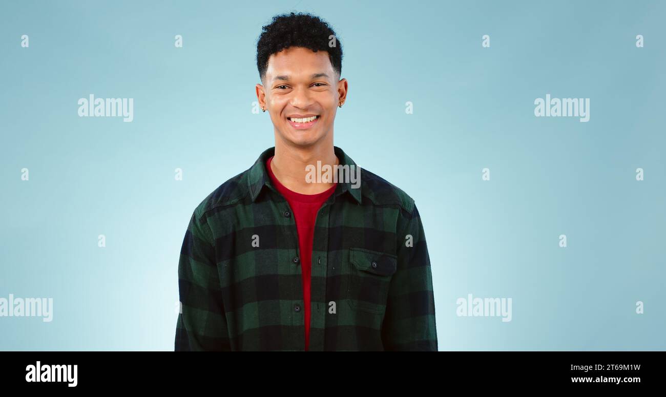 Portrait, smile and happy man laughing in studio with joke, humor or ...
