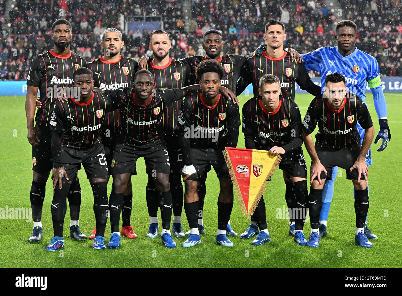 players of Lens with Kevin Danso (4) of RC Lens, Facundo Medina (14) of ...