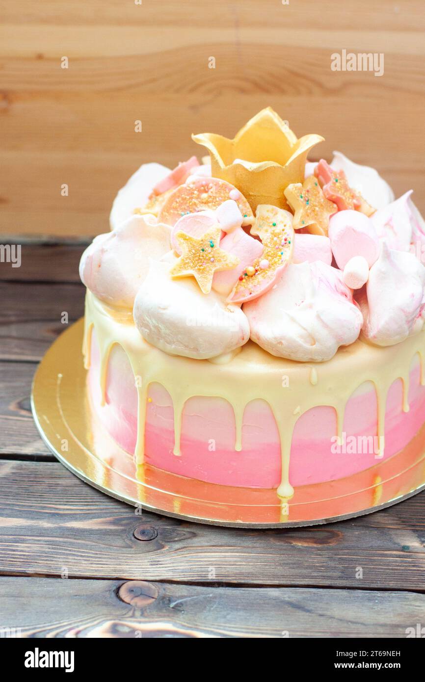 Gradient pink birthday cake with meringue clouds, chocolate stars ...