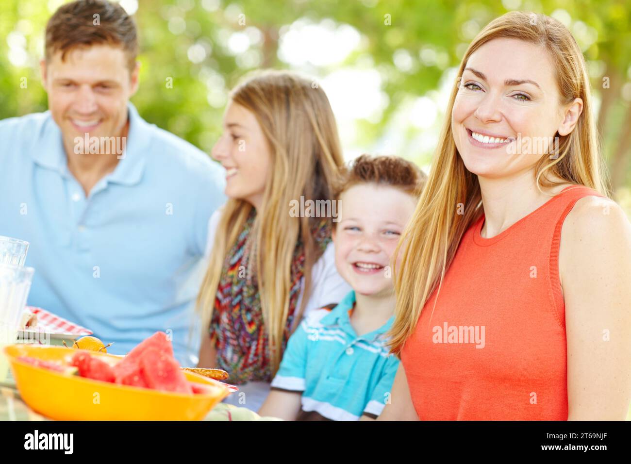 Having a family is so fulfilling. A happy young family relaxing in the ...