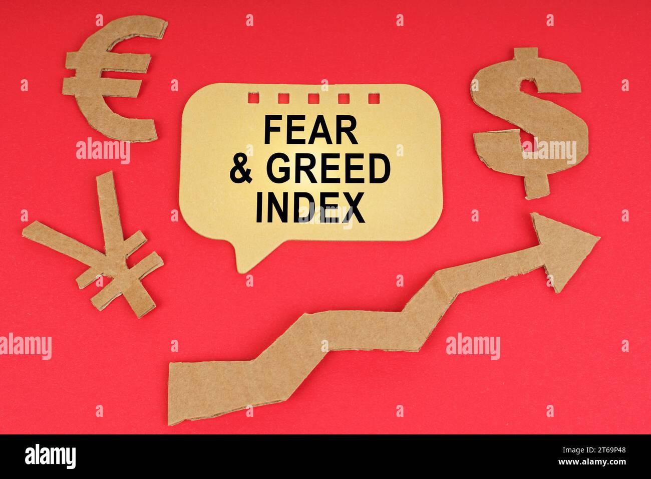 Business concept. On the red surface there are money symbols, an arrow ...