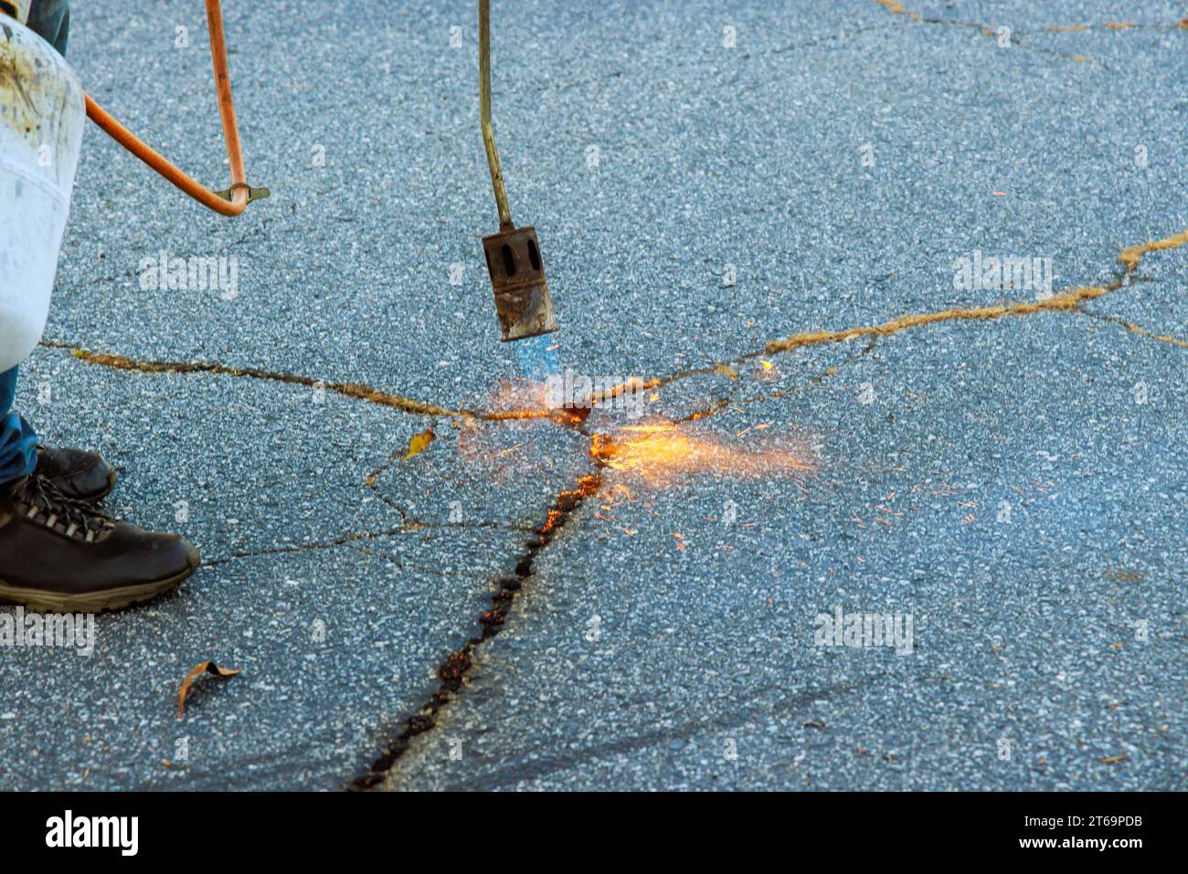 Burning asphalt hi-res stock photography and images - Alamy
