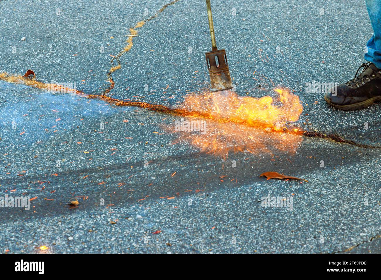Burning asphalt hi-res stock photography and images - Alamy