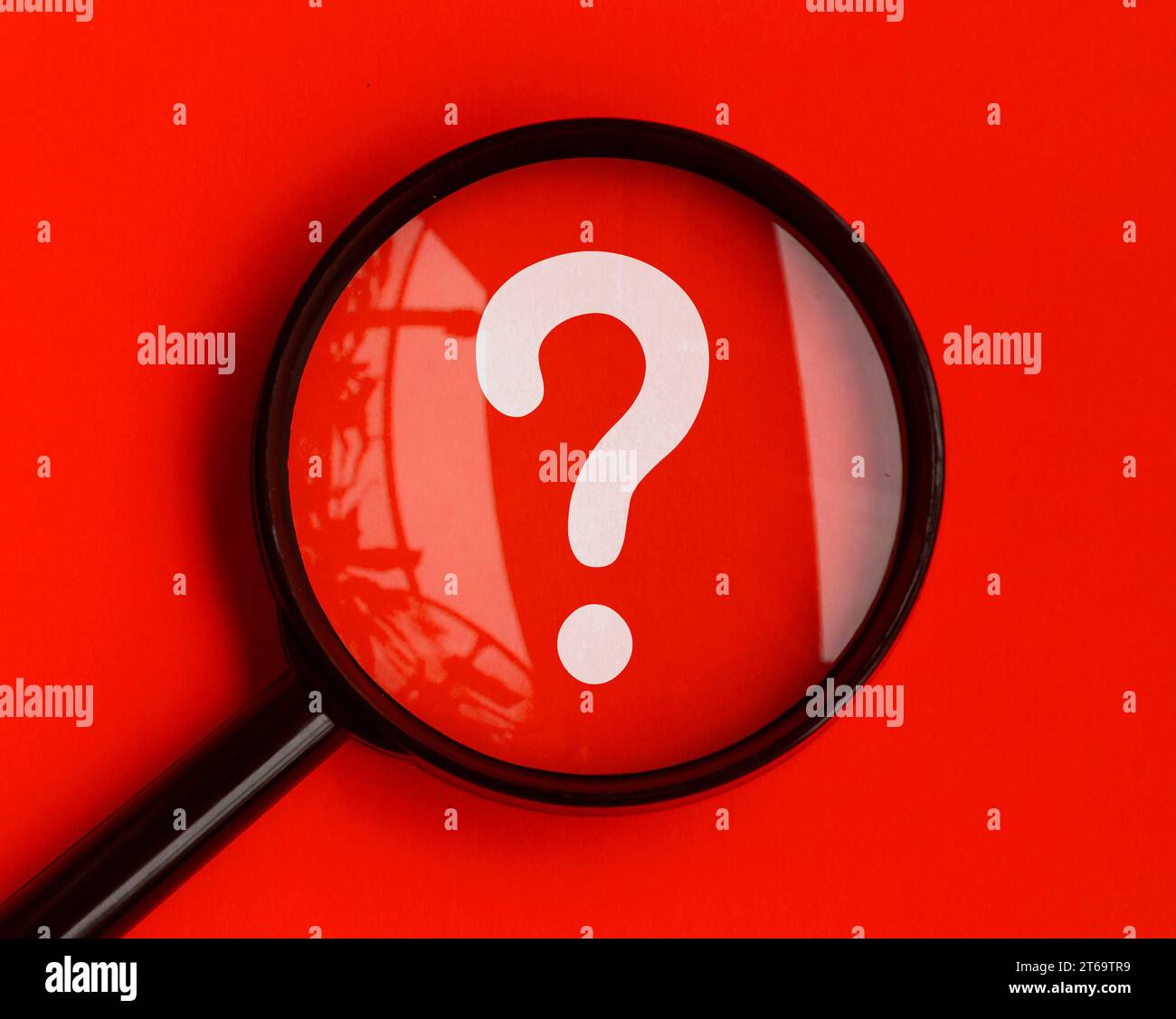 Question mark on red background with magnifying glass. Question and ...