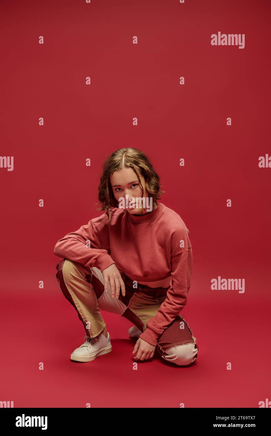 self-expression, stylish gen z girl in patchwork pants and cropped long ...