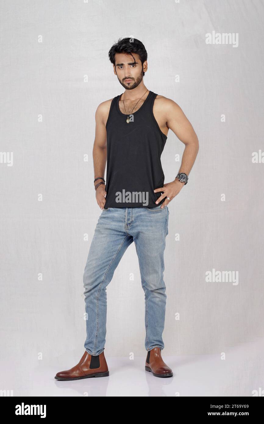 Confident indian man poses hi-res stock photography and images - Alamy