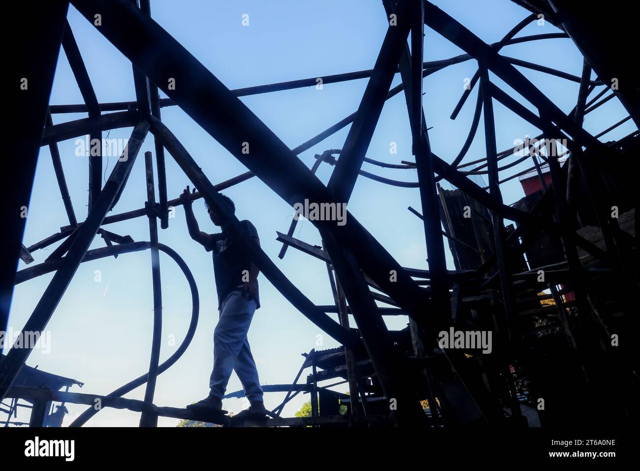 Paranaque City, Philippines. 9th Nov, 2023. A resident is seen inside ...