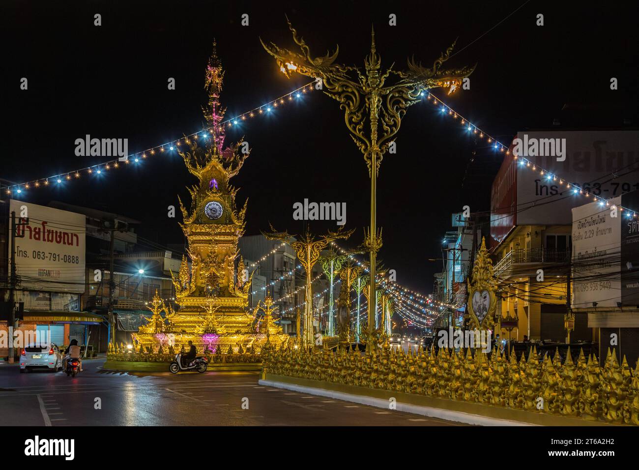 Clock Tower of Chiang Rai monument designed by local artist Chalermchai ...