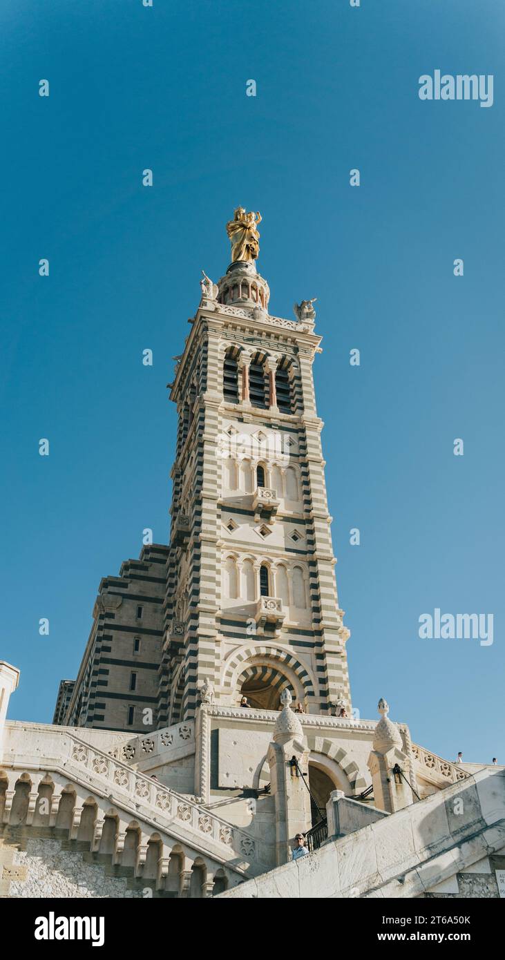 A majestic view of the Notre-Dame de la Garde tower in Marseille ...