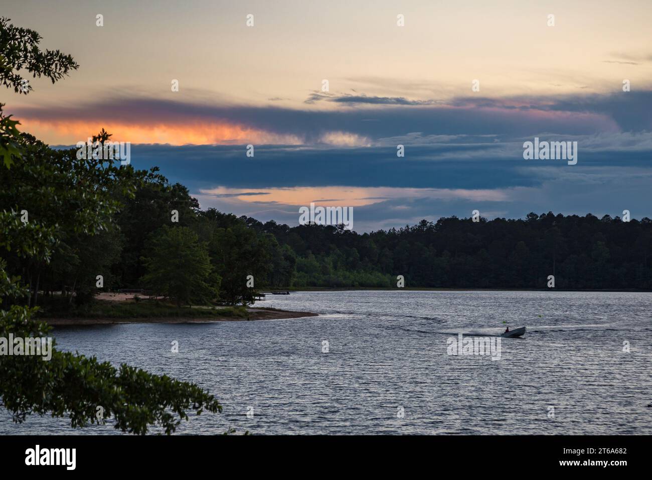 Man boating on the lake at Little Black Creek Campground and Park near ...