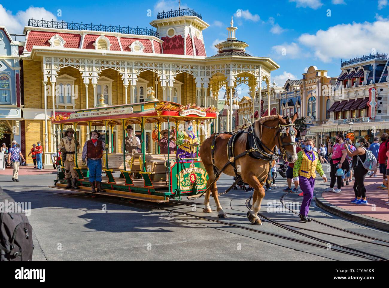Horse pulling trolley car with Disney characters down Main Street in ...