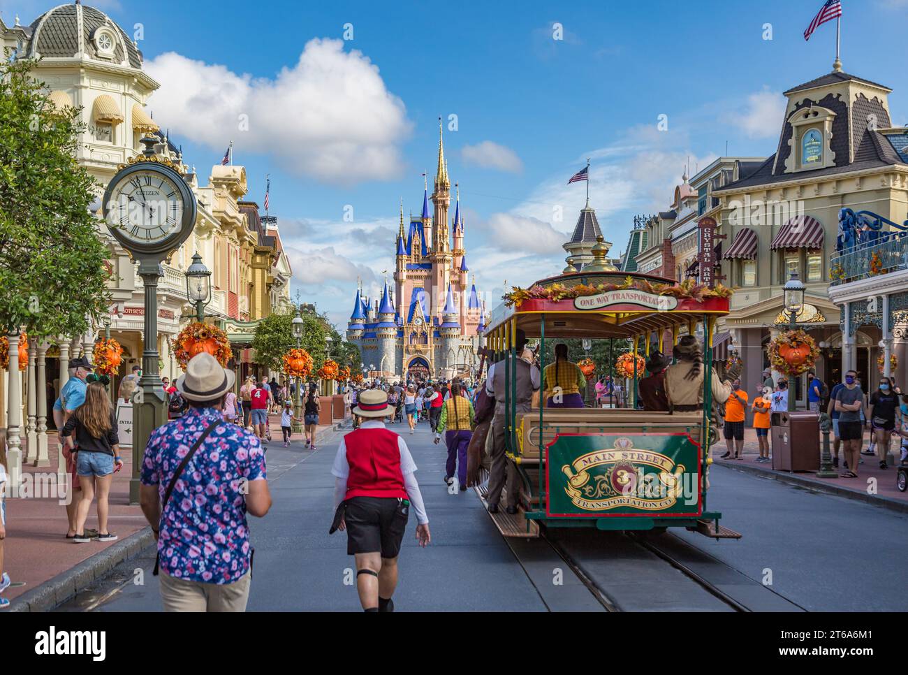 Horse pulling trolley car with Disney characters down Main Street in ...