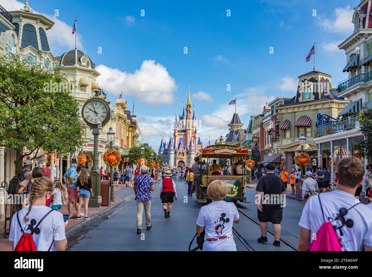 Horse pulling trolley car with Disney characters down Main Street in ...