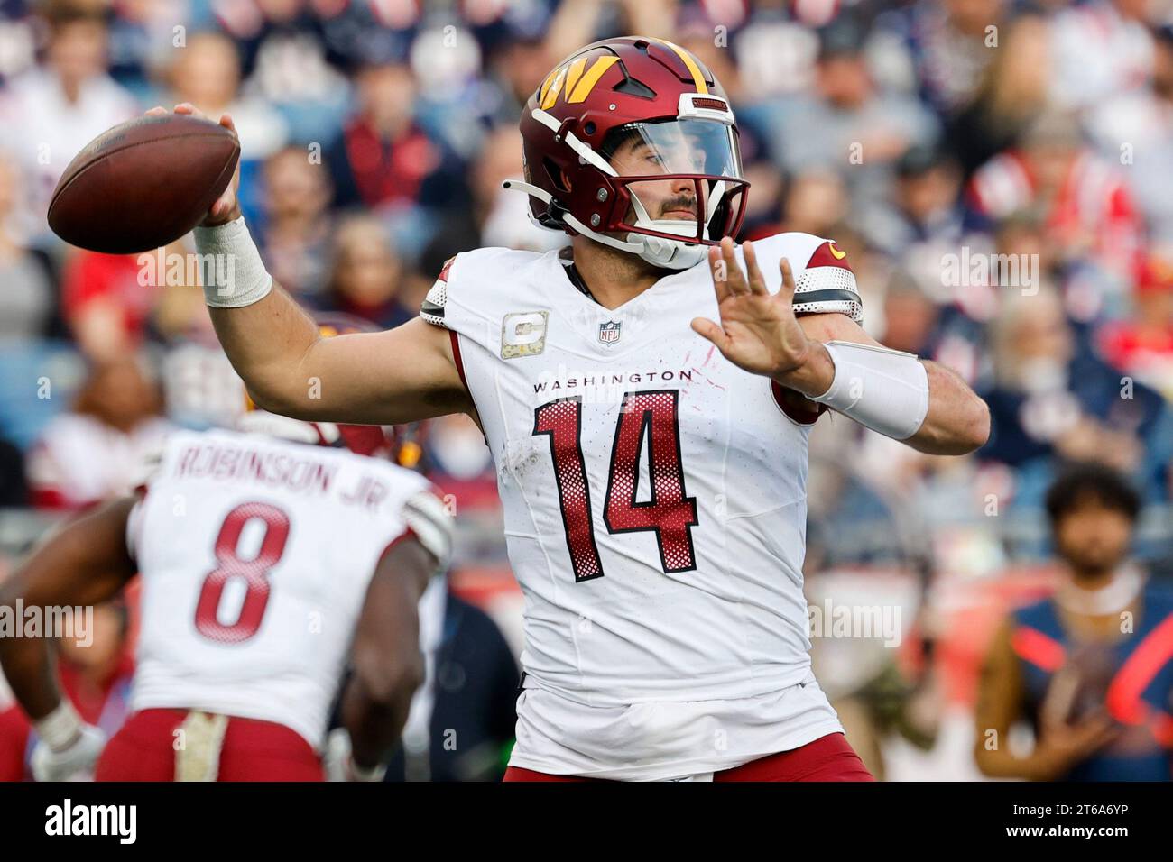 Washington Commanders quarterback Sam Howell (14) prepares to make a ...