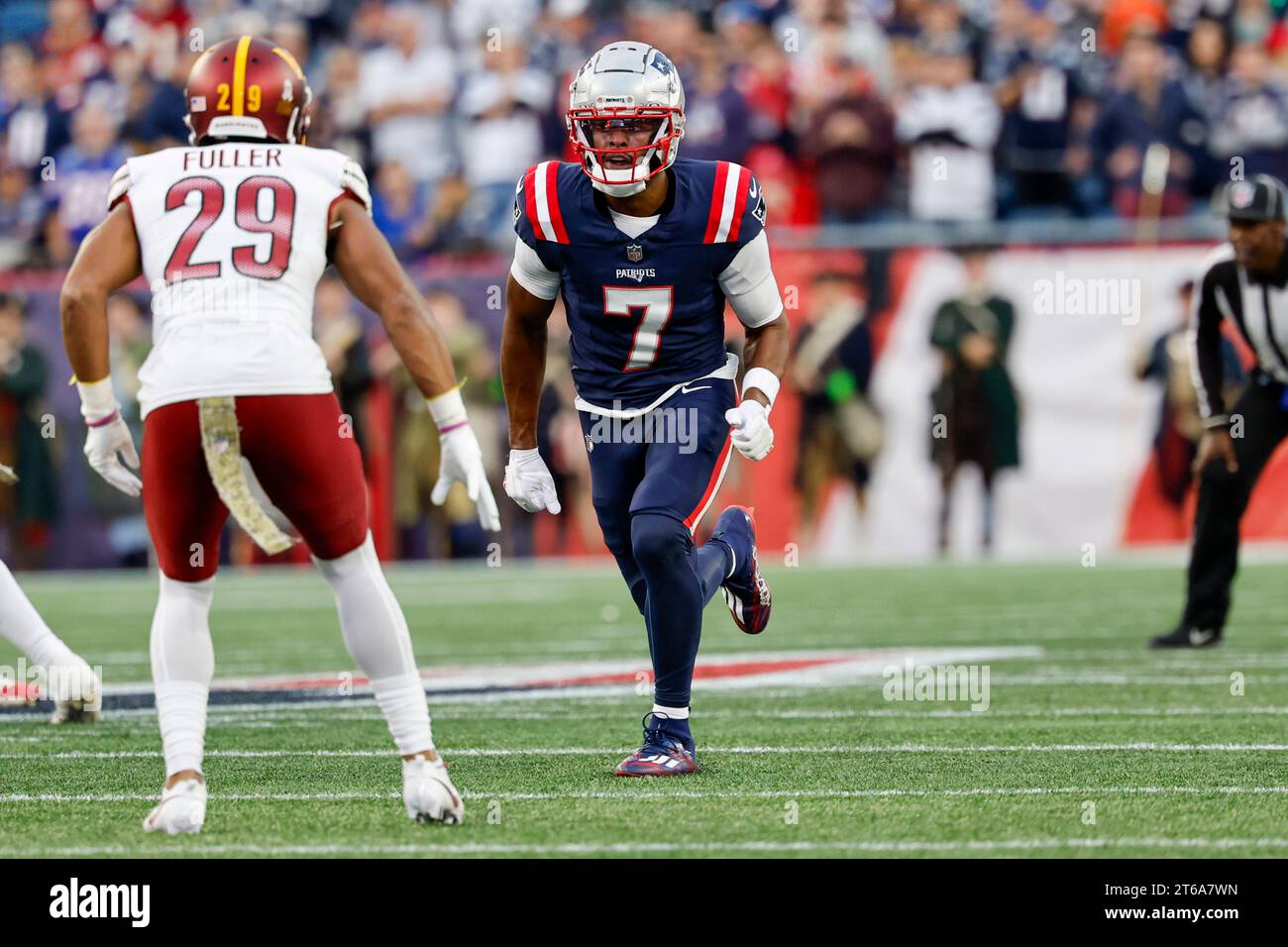 New England Patriots wide receiver JuJu Smith-Schuster (7) is covered ...