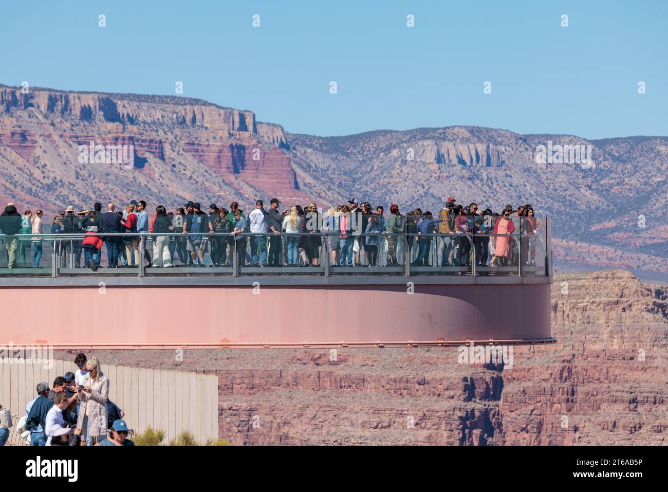 Visitors view the Grand Canyon from the Skybridge, a glass floored ...