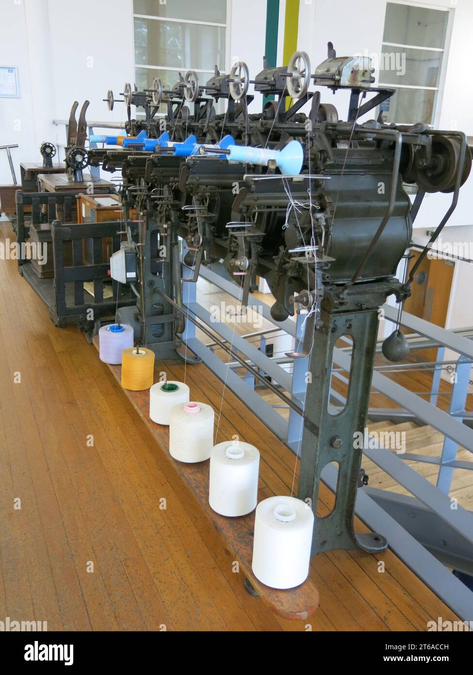 A display of some of the spools of thread & machinery that was used at ...