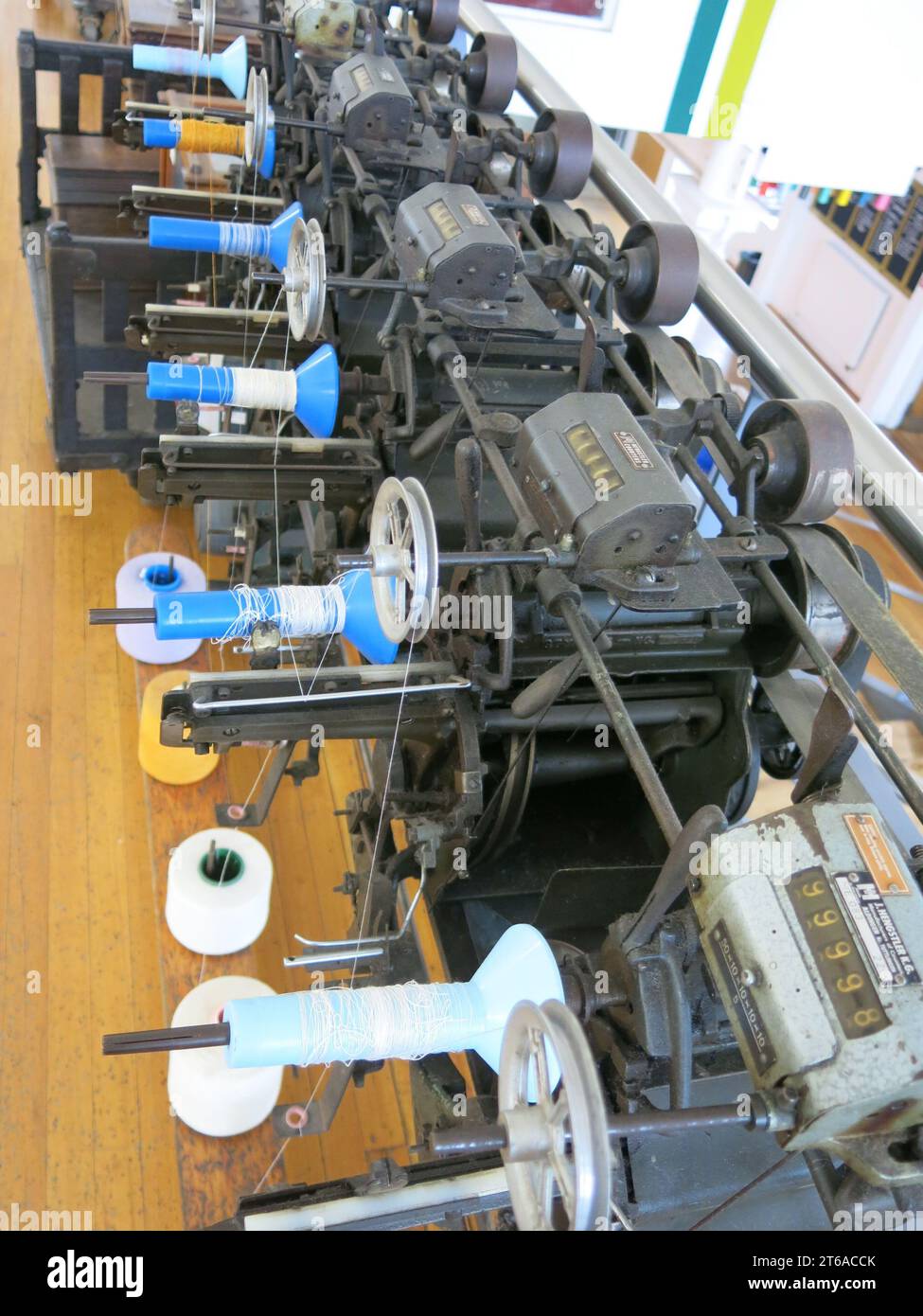 A display of some of the spools of thread & machinery that was used at ...