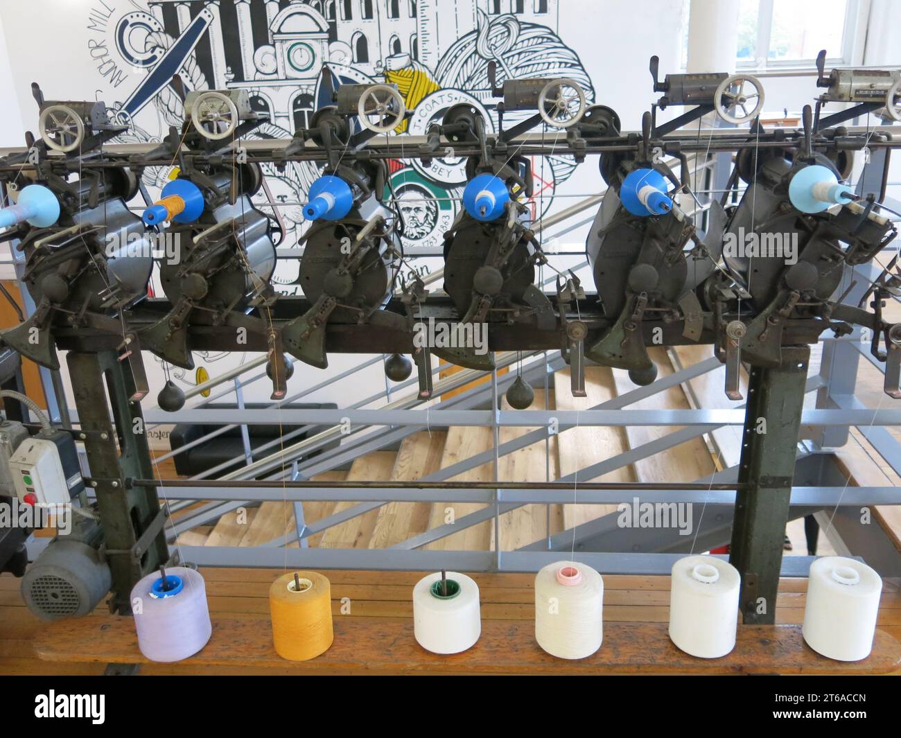 A display of some of the spools of thread & machinery that was used at ...