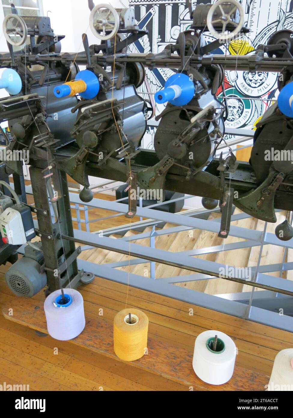 A display of some of the spools of thread & machinery that was used at ...