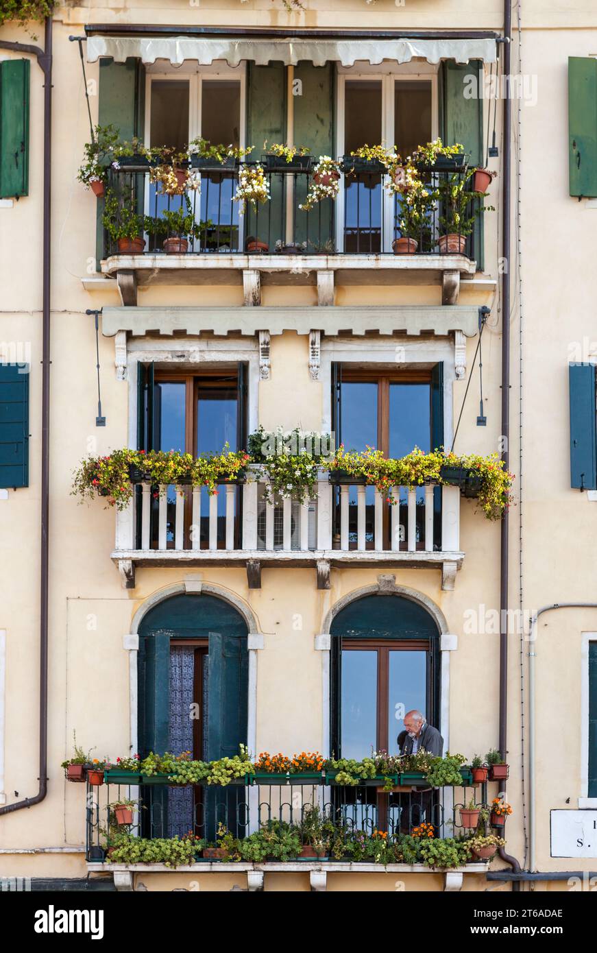 Venice house with three flowered balconies Stock Photo - Alamy