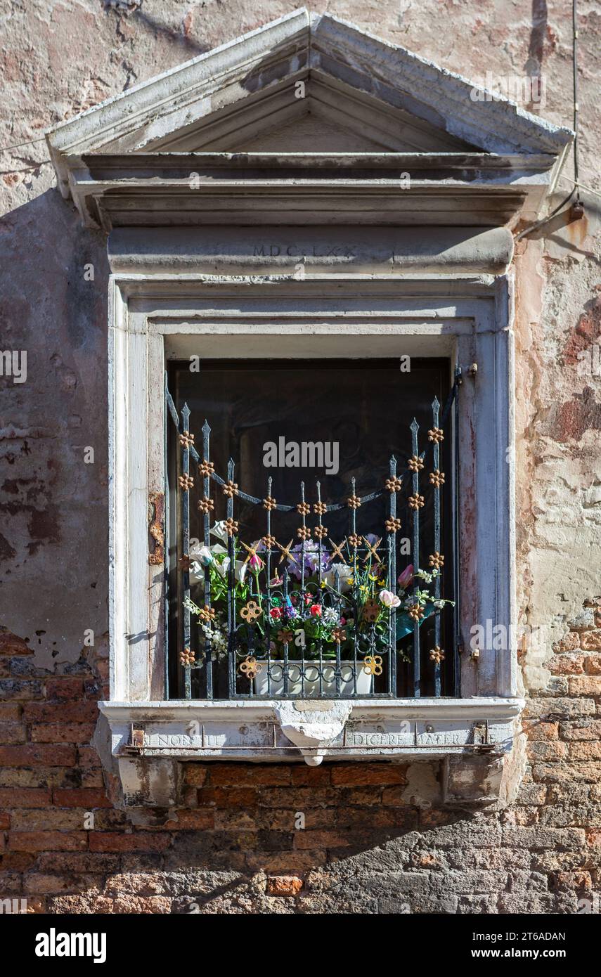 Ornate and barred window in Castello, Venice, Italy Stock Photo - Alamy