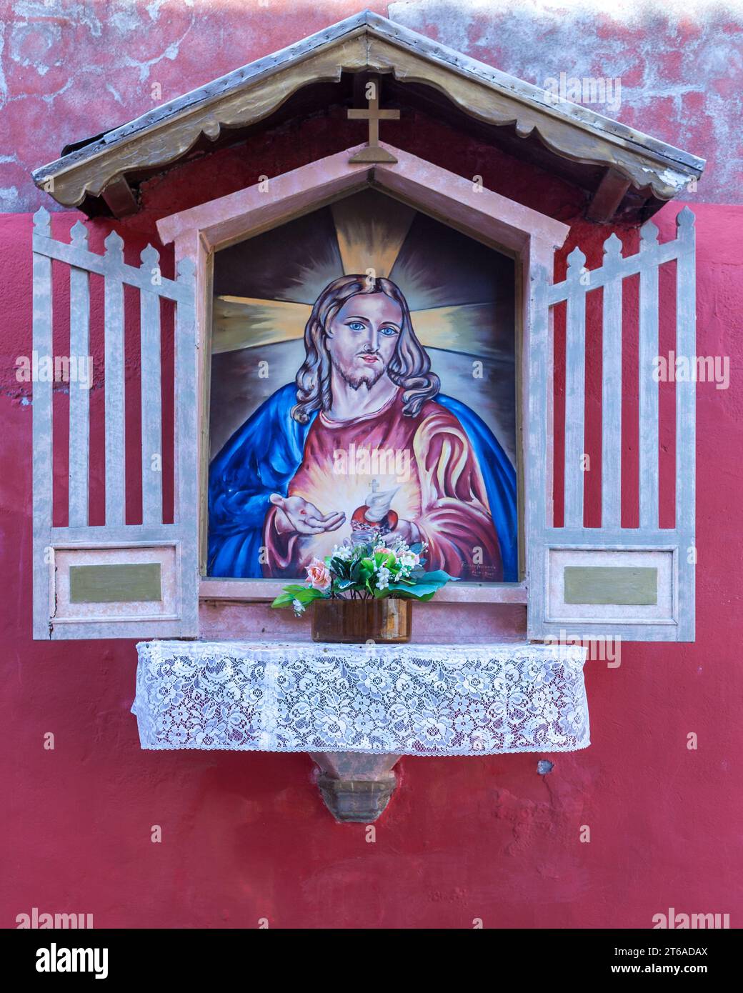 Icon of Christ in a decorated niche in Castello, Venice, Italy Stock ...