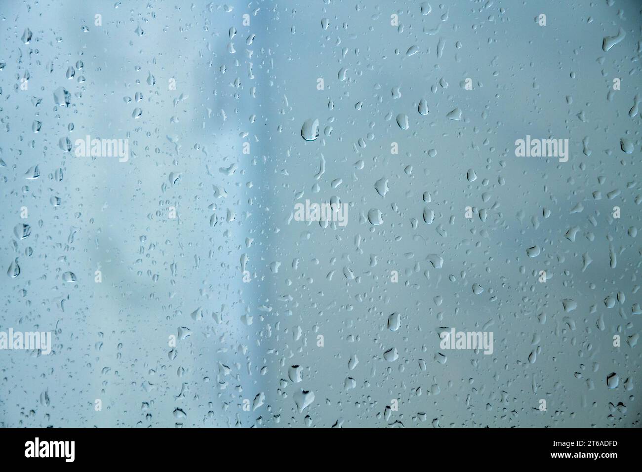 Rain drops on a window. Abstract background wallpaper Stock Photo - Alamy