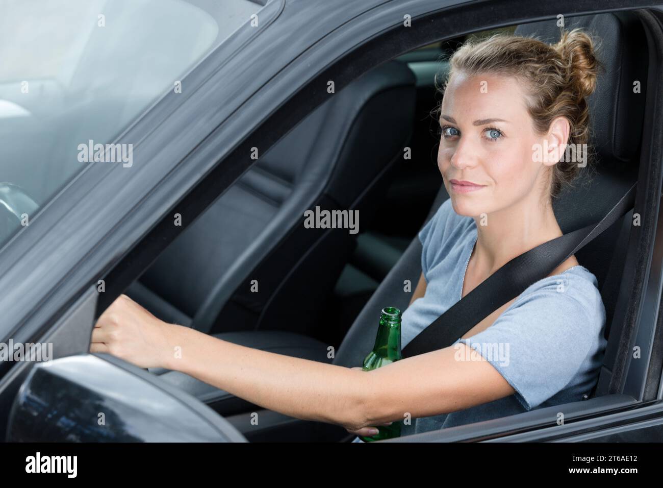 woman driver drinking beer while driving Stock Photo - Alamy