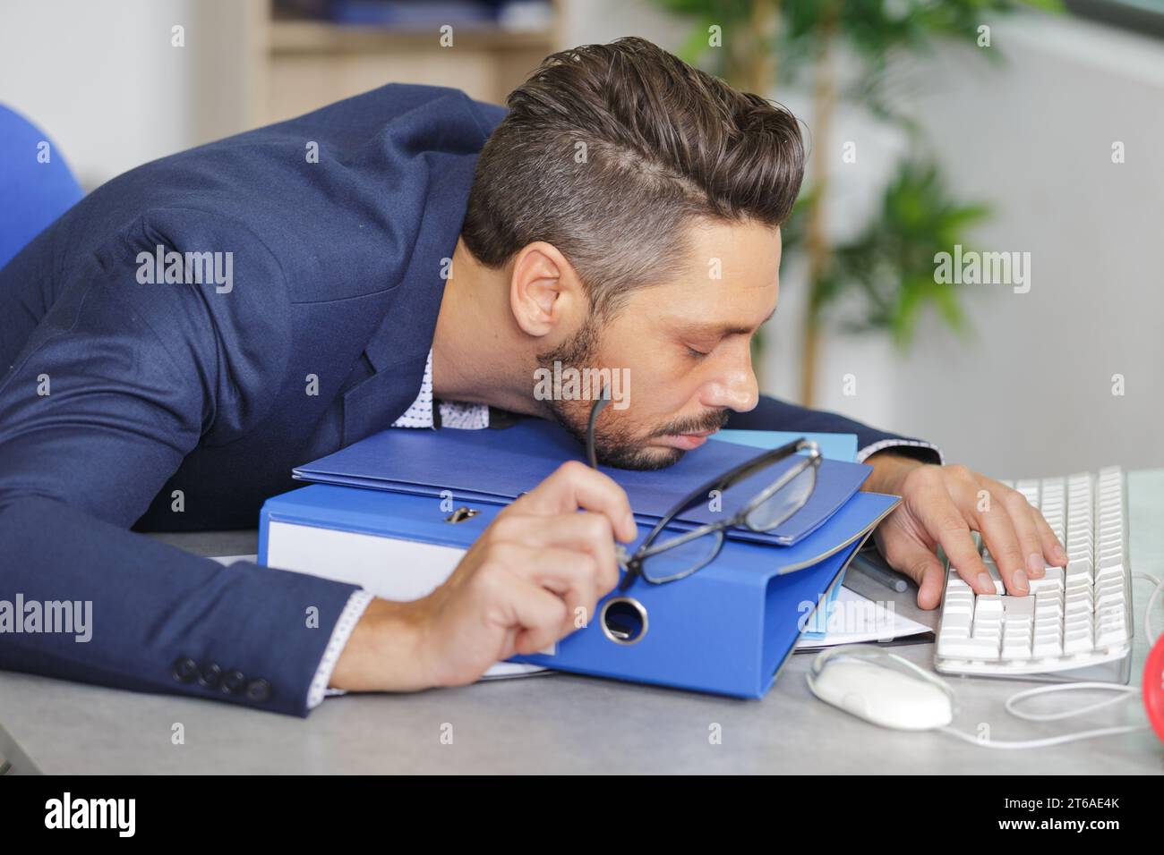 Man sleeping keyboard in computer hi-res stock photography and images ...
