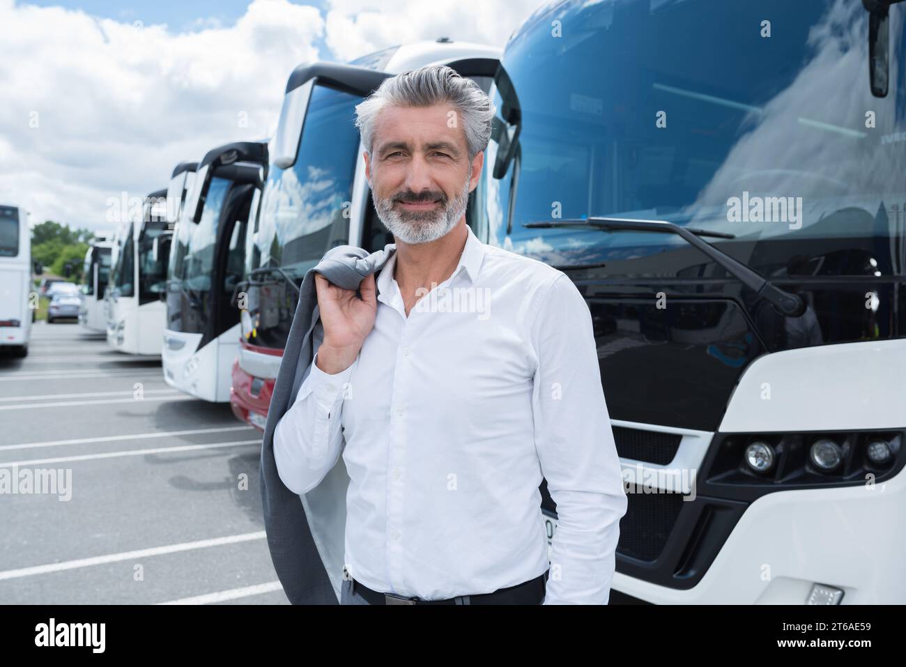 Handsome smiling bus driver hi-res stock photography and images - Alamy