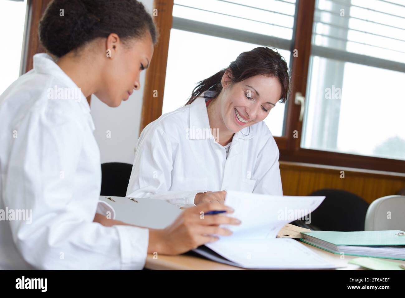 female doctors at the library Stock Photo - Alamy