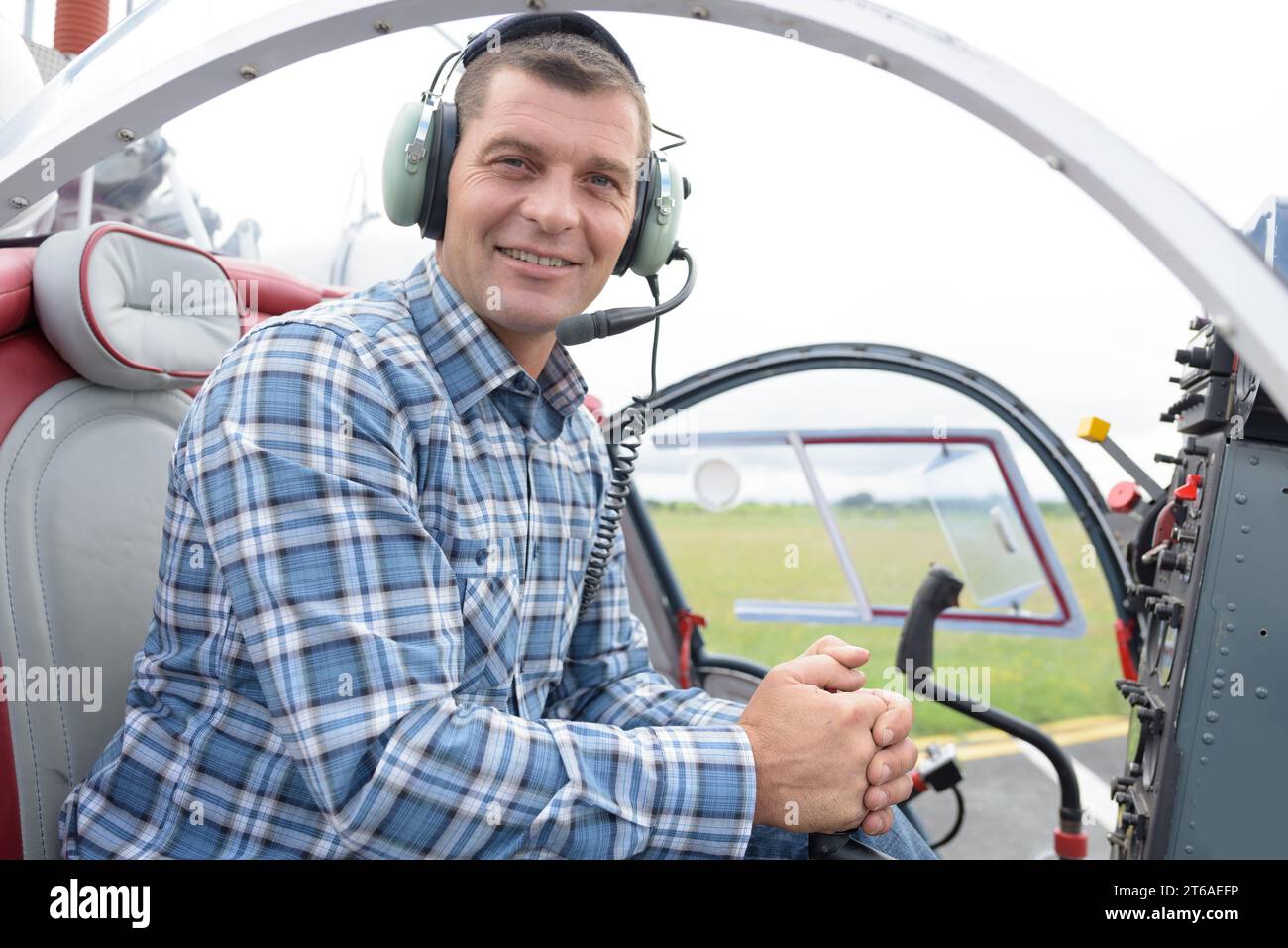 Old man helicopter pilot hi-res stock photography and images - Alamy