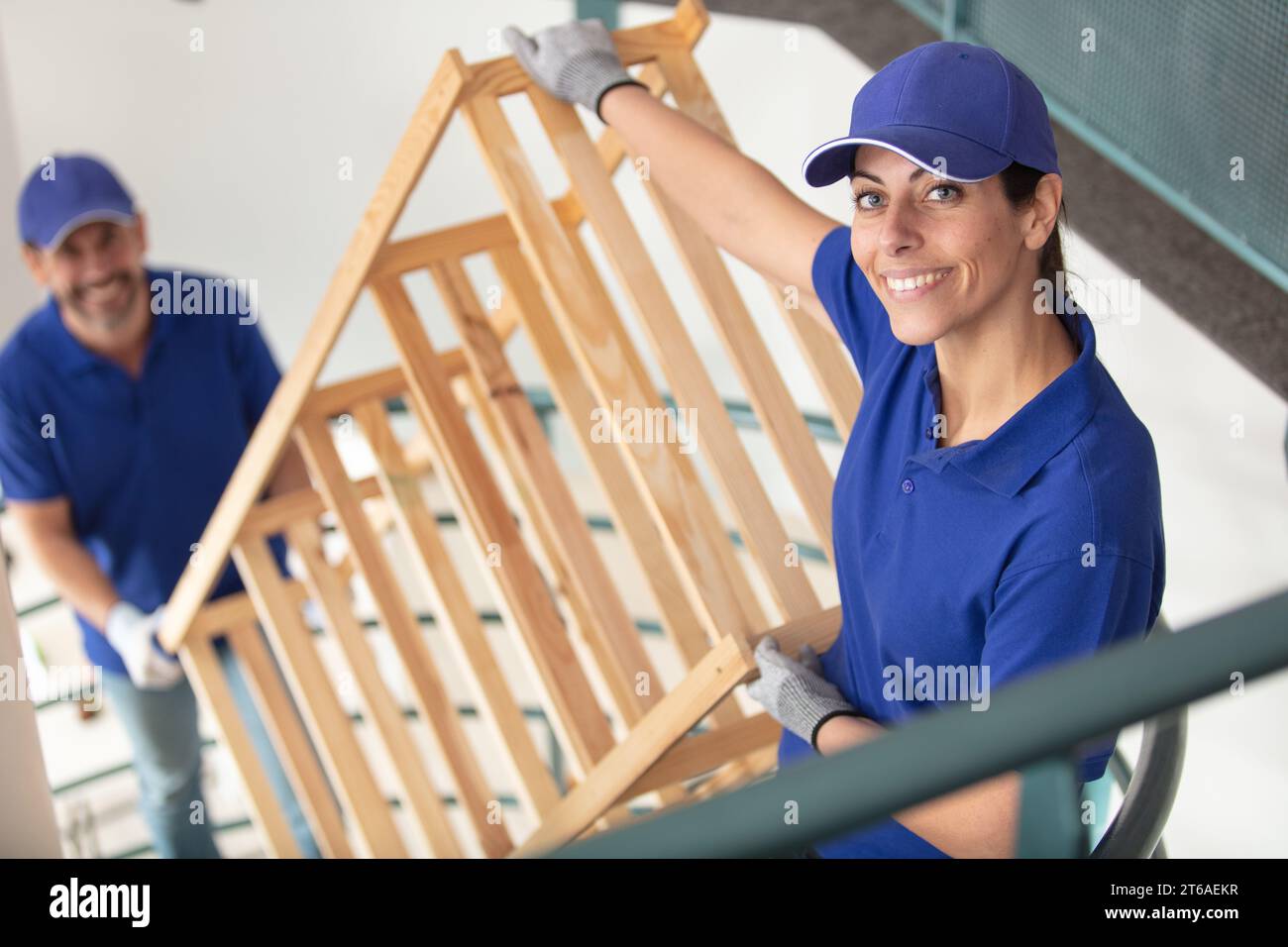 home improvement concept - smiling workers Stock Photo - Alamy