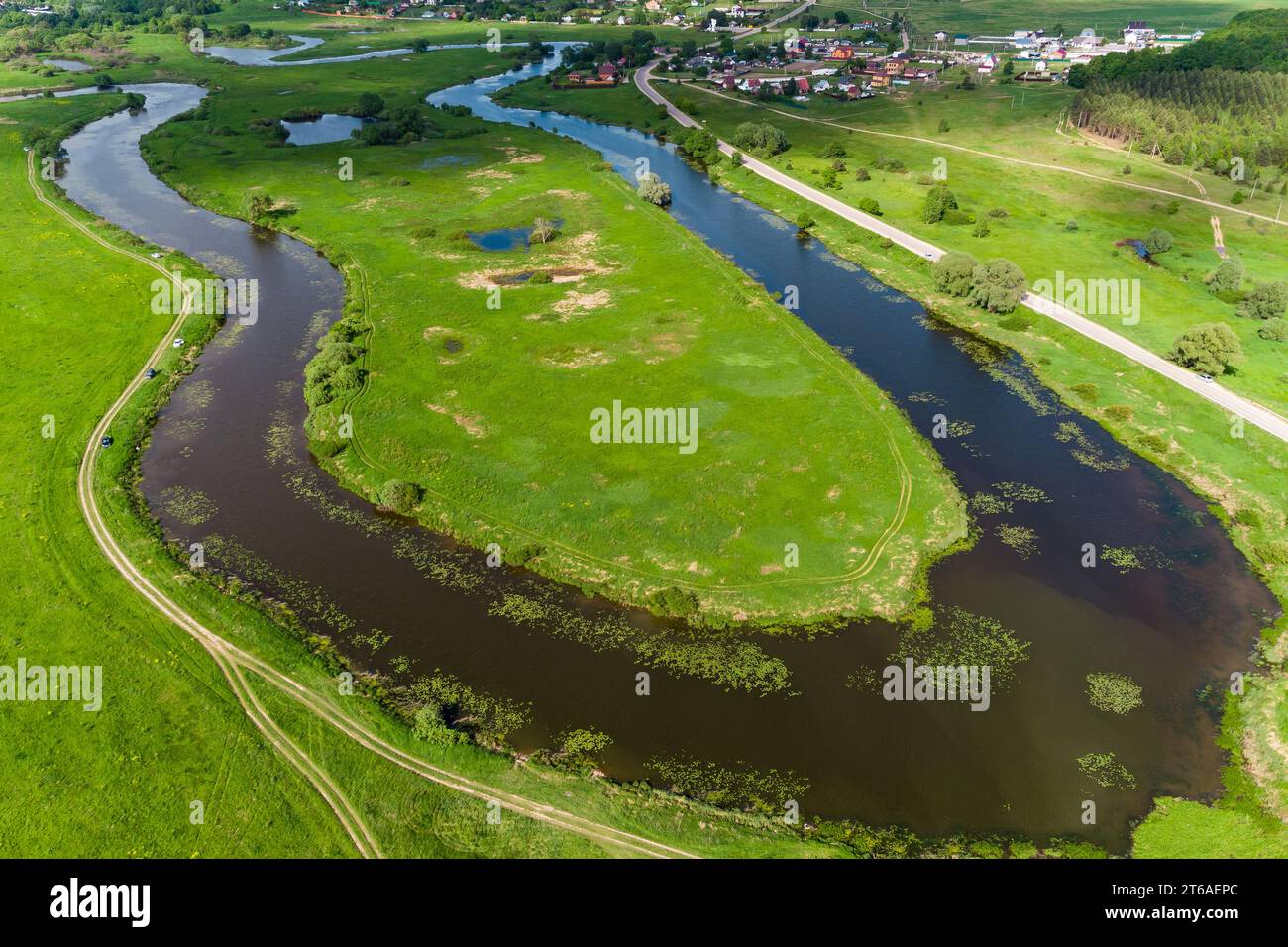 The bend of the oxbow lake Ogublyanka from the air, green natural ...